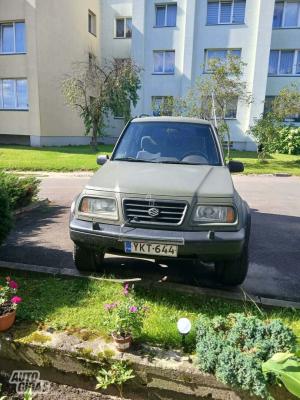 Green Suzuki Vitara 1997 in Siauliai, with an engine capacity of 2.00 L and mileage of 285 thousand km for 4200 €, photo  on AUTOMOTO.COM.LV