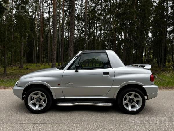Grey Suzuki Vitara 1999 in Valmiera, with an engine capacity of 1.60 L and mileage of 227 thousand km for 9990 €, photo 2 on AUTOMOTO.COM.LV