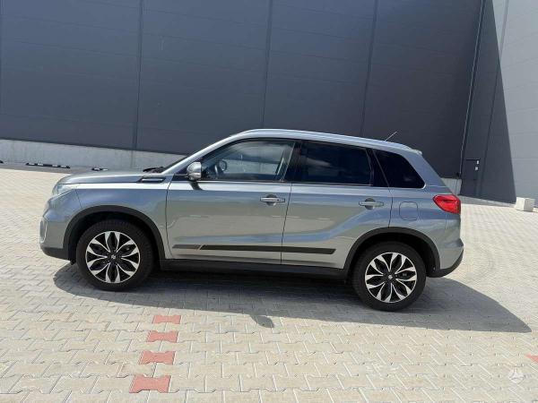 Grey Suzuki Vitara 2015 in Siauliai, with an engine capacity of 1.60 L and mileage of 240 thousand km for 7400 €, photo 4 on AUTOMOTO.COM.LV