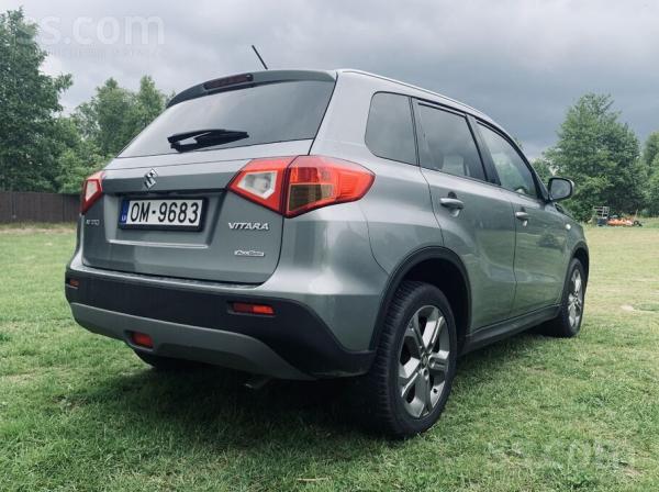 Grey Suzuki Vitara 2016 in Liepaja, with an engine capacity of 1.60 L and mileage of 172 thousand km for 11200 €, photo 6 on AUTOMOTO.COM.LV