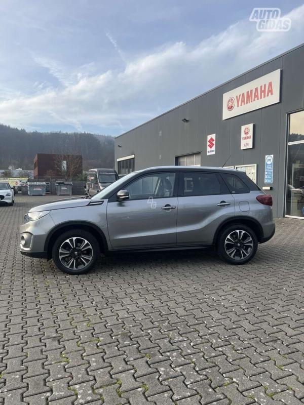 Grey Suzuki Vitara 2021 in Kaunas, with an engine capacity of 1.40 L and mileage of 63 thousand km for 21628 €, photo 6 on AUTOMOTO.COM.LV