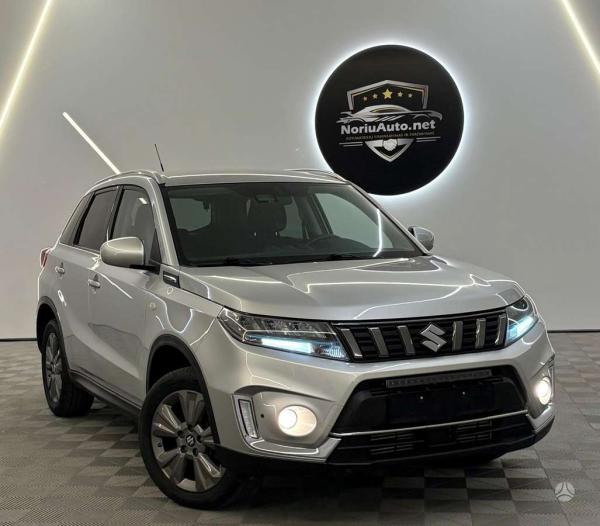 Grey Suzuki Vitara 2021 in Marijampole, with an engine capacity of 1.37 L and mileage of 163 thousand km for 13850 €, photo 1 on AUTOMOTO.COM.LV