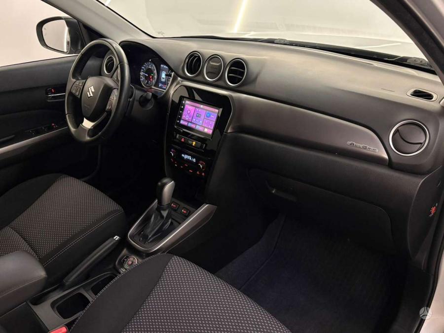 Grey Suzuki Vitara 2021 in Marijampole, with an engine capacity of 1.37 L and mileage of 163 thousand km for 13850 €, photo 14 on AUTOMOTO.COM.LV