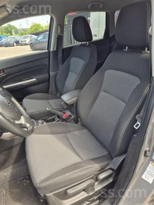 Grey Suzuki Vitara 2022 in Riga, with an engine capacity of 1.40 L and mileage of 75 thousand km for 16190 €, photo 14 on AUTOMOTO.COM.LV