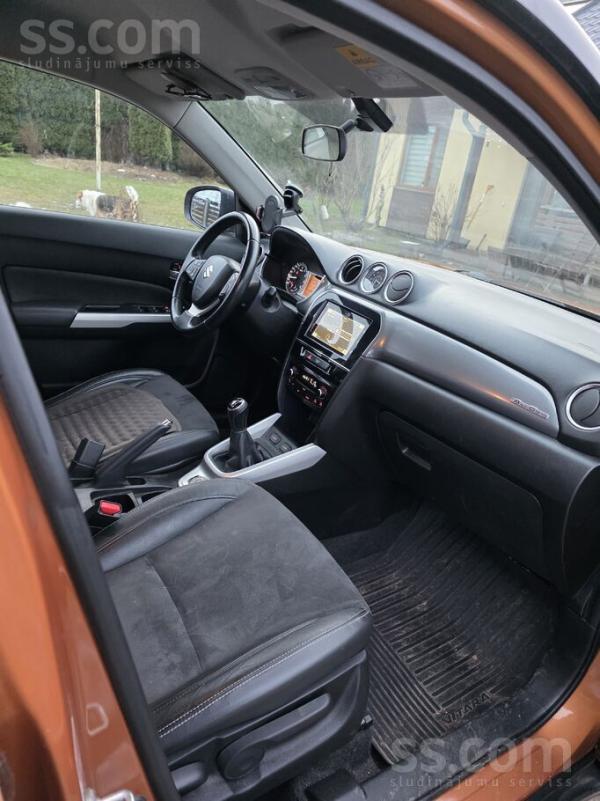 Orange Suzuki Vitara 2015 in Riga, with an engine capacity of 1.60 L and mileage of 179 thousand km for 8900 €, photo 2 on AUTOMOTO.COM.LV