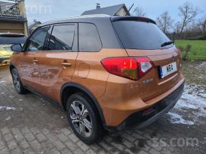 Orange Suzuki Vitara 2015 in Riga, with an engine capacity of 1.60 L and mileage of 179 thousand km for 8900 €, photo 4 on AUTOMOTO.COM.LV