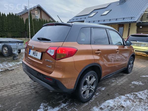 Orange Suzuki Vitara 2015 in Riga, with an engine capacity of 1.60 L and mileage of 179 thousand km for 8900 €, photo 6 on AUTOMOTO.COM.LV
