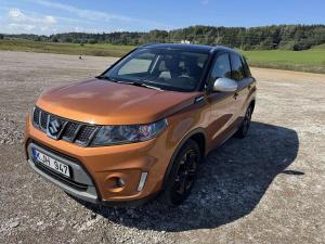 Orange Suzuki Vitara 2018 in Vilnius, with an engine capacity of 1.37 L and mileage of 90 thousand km for 12000 €, photo  on AUTOMOTO.COM.LV