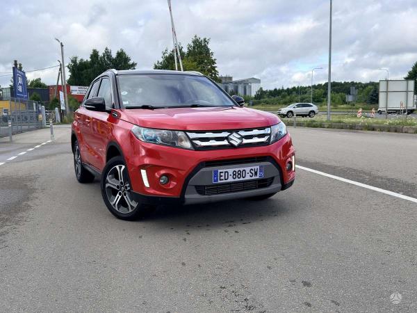 Red Suzuki Vitara 2016 in Panevezys, with an engine capacity of 1.60 L and mileage of 276 thousand km for 9990 €, photo 7 on AUTOMOTO.COM.LV