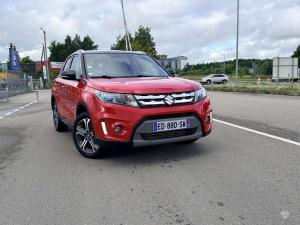 Red Suzuki Vitara 2016 in Panevezys, with an engine capacity of 1.60 L and mileage of 276 thousand km for 9990 €, photo 7 on AUTOMOTO.COM.LV