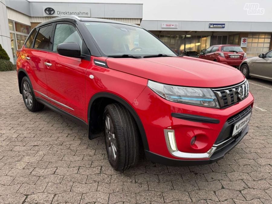 Red Suzuki Vitara 2023 in Kaunas, with an engine capacity of 1.40 L and mileage of 22 thousand km for 22390 €, photo 5 on AUTOMOTO.COM.LV