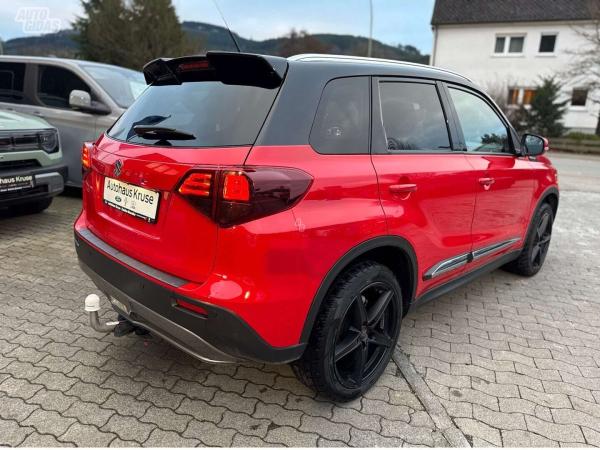 Red Suzuki Vitara 2023 in Kaunas, with an engine capacity of 1.40 L and mileage of 27 thousand km for 23420 €, photo 8 on AUTOMOTO.COM.LV