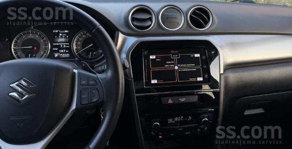 White Suzuki Vitara 2019 in Riga, with an engine capacity of 1.00 L and mileage of 160 thousand km for 9700 €, photo 9 on AUTOMOTO.COM.LV