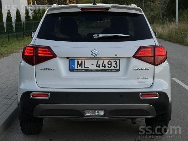 White Suzuki Vitara 2020 in Riga, with an engine capacity of 1.40 L and mileage of 120 thousand km for 13800 €, photo 6 on AUTOMOTO.COM.LV