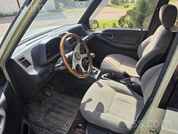 Yellow Suzuki Vitara 1991 in Madona, with an engine capacity of 1.60 L and mileage of 81 thousand km for 2000 €, photo 5 on AUTOMOTO.COM.LV
