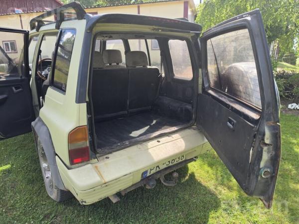 Yellow Suzuki Vitara 1991 in Madona, with an engine capacity of 1.60 L and mileage of 81 thousand km for 2000 €, photo 8 on AUTOMOTO.COM.LV