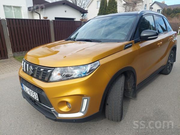 Yellow Suzuki Vitara 2020 in Riga, with an engine capacity of 1.40 L and mileage of 0 thousand km for 13785 €, photo 1 on AUTOMOTO.COM.LV
