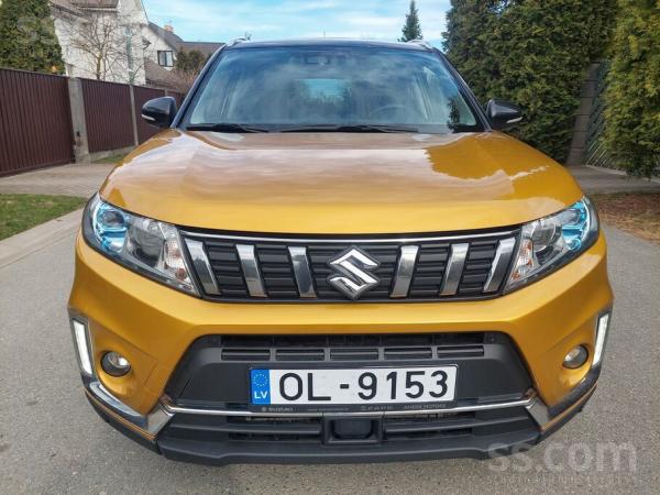 Yellow Suzuki Vitara 2020 in Riga, with an engine capacity of 1.40 L and mileage of 0 thousand km for 13785 €, photo 2 on AUTOMOTO.COM.LV