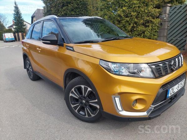Yellow Suzuki Vitara 2020 in Riga, with an engine capacity of 1.40 L and mileage of 0 thousand km for 13785 €, photo 3 on AUTOMOTO.COM.LV