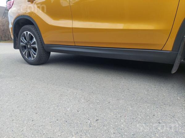 Yellow Suzuki Vitara 2020 in Riga, with an engine capacity of 1.40 L and mileage of 0 thousand km for 13785 €, photo 4 on AUTOMOTO.COM.LV