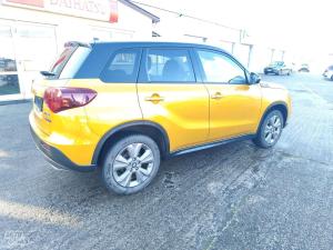 Yellow Suzuki Vitara 2023 in Kaunas, with an engine capacity of 1.50 L and mileage of 20 thousand km for 25274 €, photo 2 on AUTOMOTO.COM.LV