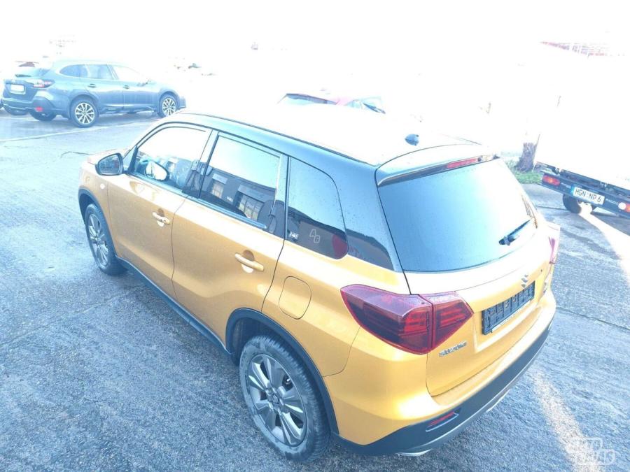Yellow Suzuki Vitara 2023 in Kaunas, with an engine capacity of 1.50 L and mileage of 20 thousand km for 25274 €, photo 6 on AUTOMOTO.COM.LV