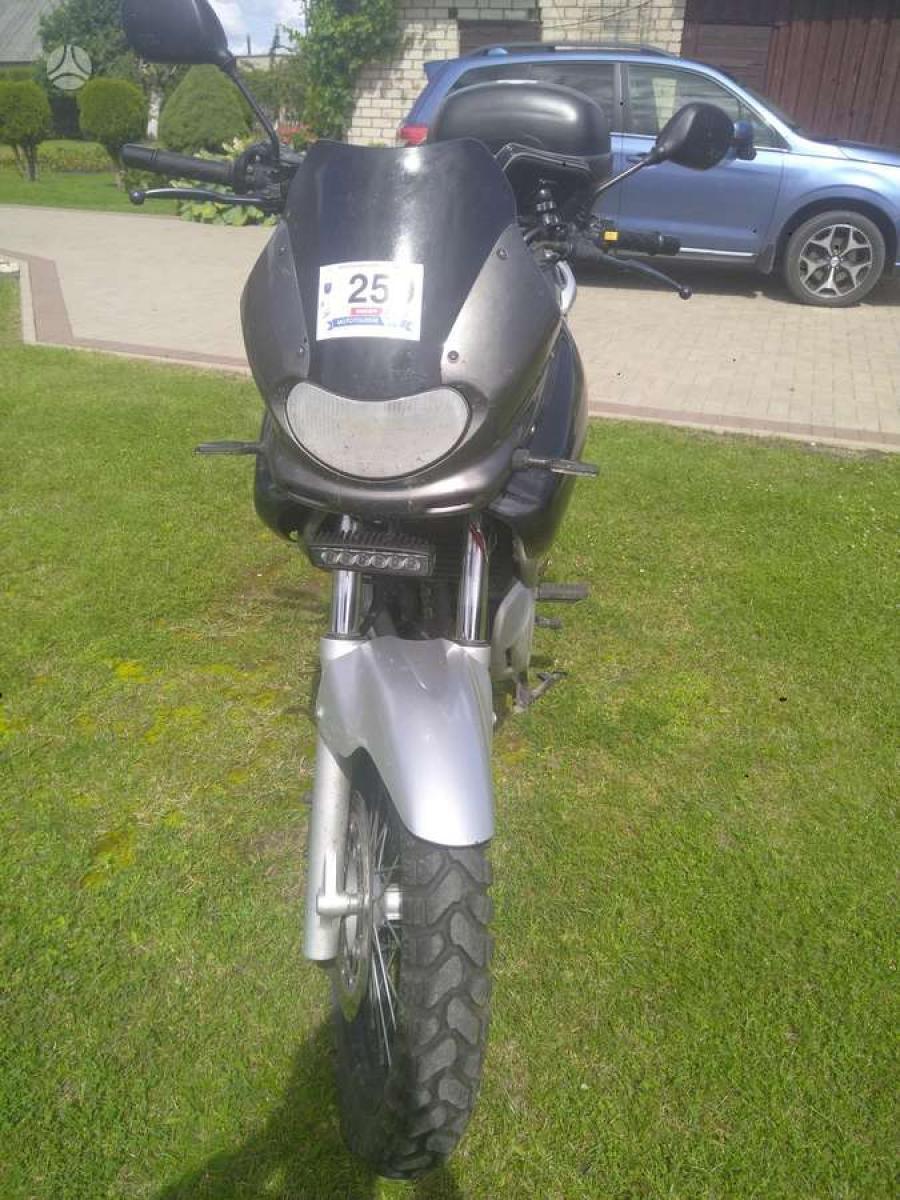 Black Suzuki XF 1997 in Kedainiai, with an engine capacity of 0.65 L and mileage of 140 thousand km for 1400 €, photo 6 on AUTOMOTO.COM.LV