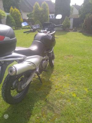 Black Suzuki XF 1997 in Kedainiai, with an engine capacity of 0.65 L and mileage of 140 thousand km for 1400 €, photo 7 on AUTOMOTO.COM.LV