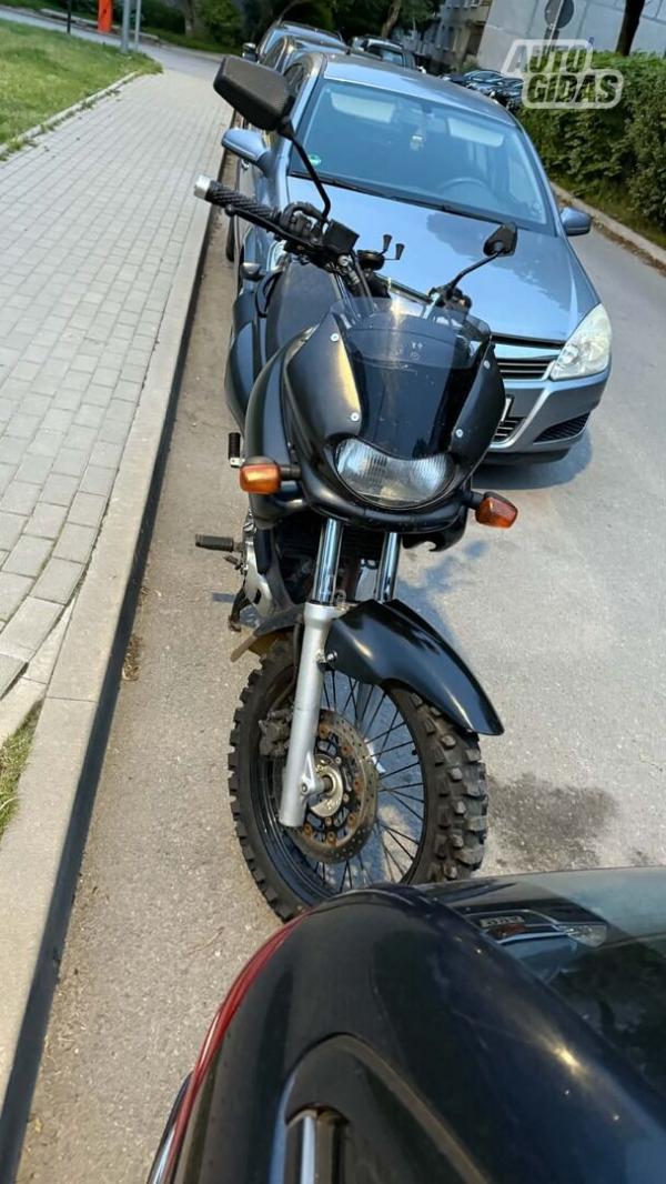 Melns Suzuki XF 1998 Utena, ar dzinēja tilpumu 0.65 L un nobraukumu 65 tūkst. km par 1200 €, foto 6 vietnē AUTOMOTO.COM.LV