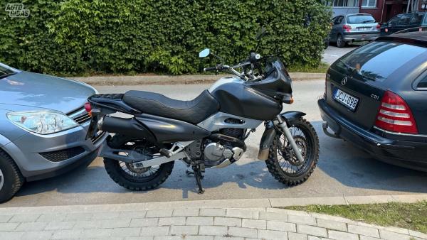 Melns Suzuki XF 1998 Utena, ar dzinēja tilpumu 0.65 L un nobraukumu 65 tūkst. km par 1200 €, foto 7 vietnē AUTOMOTO.COM.LV