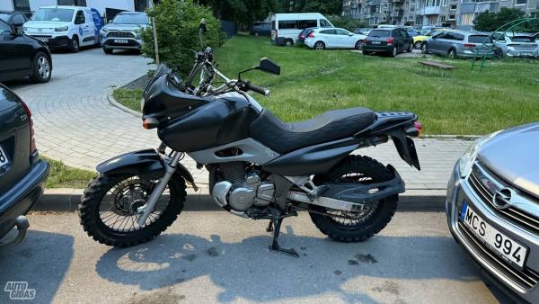 Melns Suzuki XF 1998 Utena, ar dzinēja tilpumu 0.65 L un nobraukumu 65 tūkst. km par 1200 €, foto 8 vietnē AUTOMOTO.COM.LV