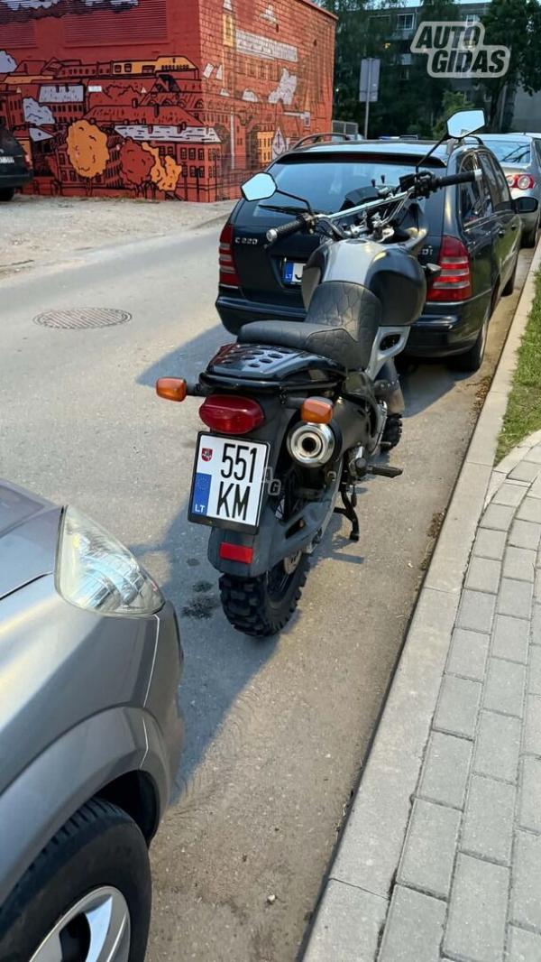 Melns Suzuki XF 1998 Utena, ar dzinēja tilpumu 0.65 L un nobraukumu 65 tūkst. km par 1200 €, foto 9 vietnē AUTOMOTO.COM.LV