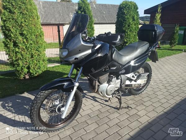 Melns Suzuki XF 1998 Jurbarkas, ar dzinēja tilpumu 0.65 L un nobraukumu 63 tūkst. km par 1390 €, foto 1 vietnē AUTOMOTO.COM.LV