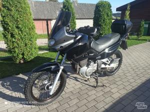 Melns Suzuki XF 1998 Jurbarkas, ar dzinēja tilpumu 0.65 L un nobraukumu 63 tūkst. km par 1390 €, foto 1 vietnē AUTOMOTO.COM.LV