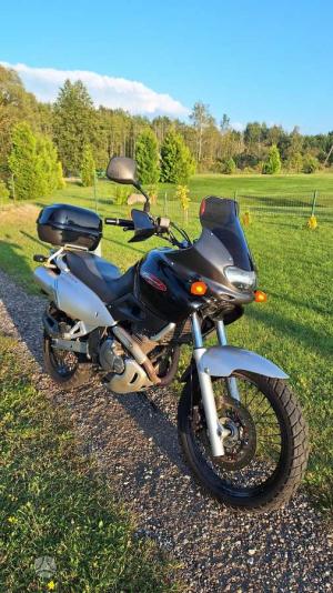 Black Suzuki XF 1999 in Vievis, with an engine capacity of 0.65 L and mileage of 37 thousand km for 1400 €, photo 4 on AUTOMOTO.COM.LV