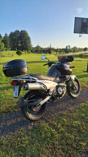 Black Suzuki XF 1999 in Vievis, with an engine capacity of 0.65 L and mileage of 37 thousand km for 1400 €, photo 5 on AUTOMOTO.COM.LV
