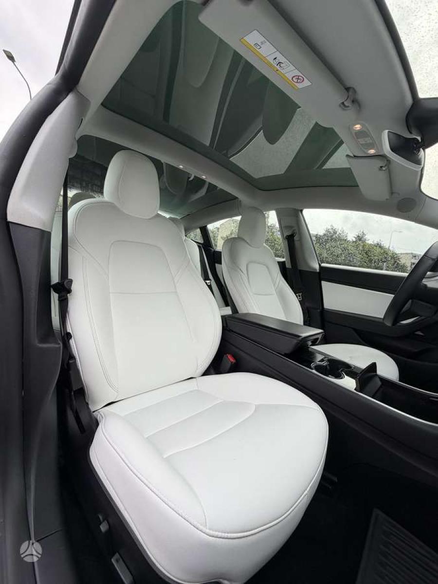 Black Tesla Model 3 2019 in Kaunas, with an engine capacity of 0.00 L and mileage of 197 thousand km for 16700 €, photo 12 on AUTOMOTO.COM.LV