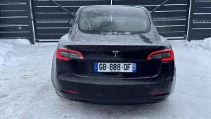 Black Tesla Model 3 2021 in Jonava, with an engine capacity of 0.00 L and mileage of 64 thousand km for 12650 €, photo 6 on AUTOMOTO.COM.LV