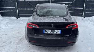 Black Tesla Model 3 2021 in Jonava, with an engine capacity of 0.00 L and mileage of 64 thousand km for 12650 €, photo 14 on AUTOMOTO.COM.LV