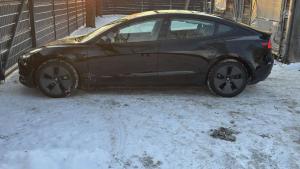 Black Tesla Model 3 2021 in Jonava, with an engine capacity of 0.00 L and mileage of 64 thousand km for 12400 €, photo 4 on AUTOMOTO.COM.LV