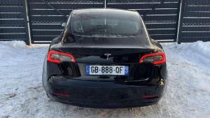 Black Tesla Model 3 2021 in Jonava, with an engine capacity of 0.00 L and mileage of 64 thousand km for 12400 €, photo 6 on AUTOMOTO.COM.LV
