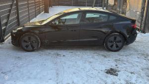 Black Tesla Model 3 2021 in Jonava, with an engine capacity of 0.00 L and mileage of 64 thousand km for 12400 €, photo 12 on AUTOMOTO.COM.LV
