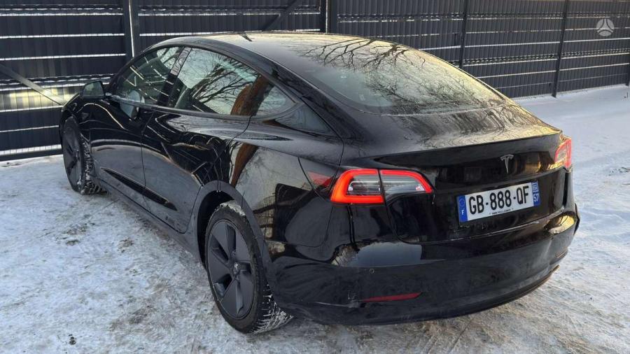 Black Tesla Model 3 2021 in Jonava, with an engine capacity of 0.00 L and mileage of 64 thousand km for 12400 €, photo 13 on AUTOMOTO.COM.LV