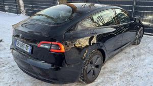Black Tesla Model 3 2021 in Jonava, with an engine capacity of 0.00 L and mileage of 64 thousand km for 12400 €, photo 15 on AUTOMOTO.COM.LV
