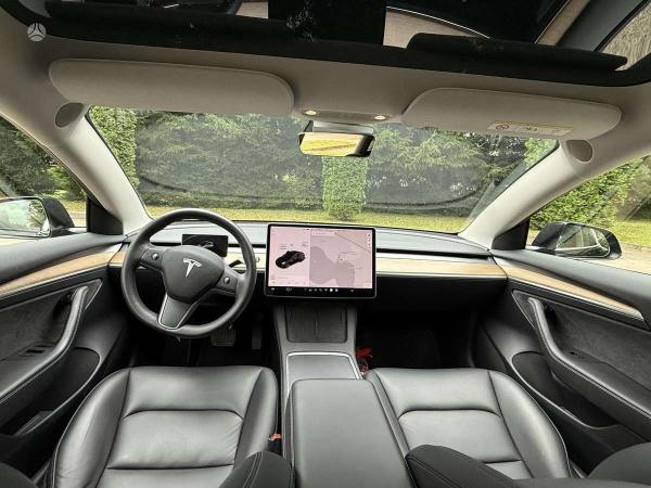 Black Tesla Model 3 2021 in Kaunas, with an engine capacity of 0.00 L and mileage of 69 thousand km for 21500 €, photo 10 on AUTOMOTO.COM.LV