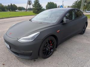 Black Tesla Model 3 2021 in Kaunas, with an engine capacity of 0.00 L and mileage of 65 thousand km for 24500 €, photo  on AUTOMOTO.COM.LV