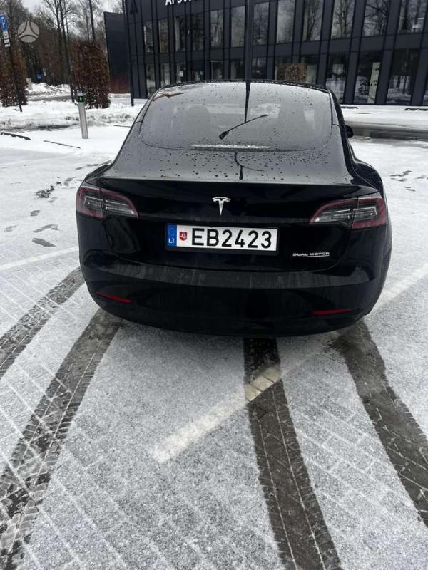 Black Tesla Model 3 2022 in Vilnius, with an engine capacity of 0.00 L and mileage of 49 thousand km for 24100 €, photo 4 on AUTOMOTO.COM.LV