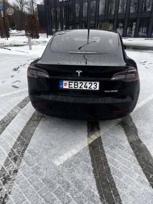 Black Tesla Model 3 2022 in Vilnius, with an engine capacity of 0.00 L and mileage of 49 thousand km for 24100 €, photo 4 on AUTOMOTO.COM.LV