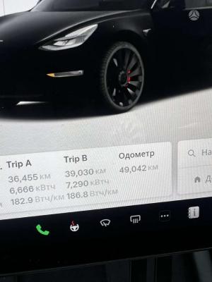 Black Tesla Model 3 2022 in Vilnius, with an engine capacity of 0.00 L and mileage of 49 thousand km for 24100 €, photo 7 on AUTOMOTO.COM.LV