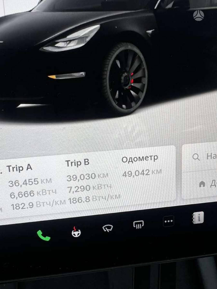 Black Tesla Model 3 2022 in Vilnius, with an engine capacity of 0.00 L and mileage of 49 thousand km for 24100 €, photo 7 on AUTOMOTO.COM.LV